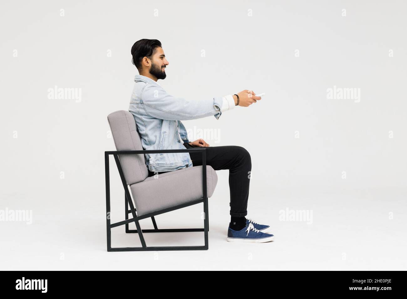 Fat man watching tv in sofa hi-res stock photography and images - Alamy