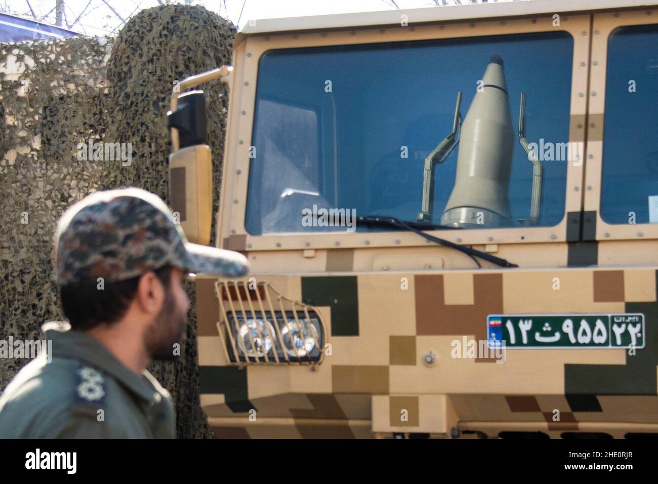 Reflection of the Qiam missile in the truck window displayed in a ...