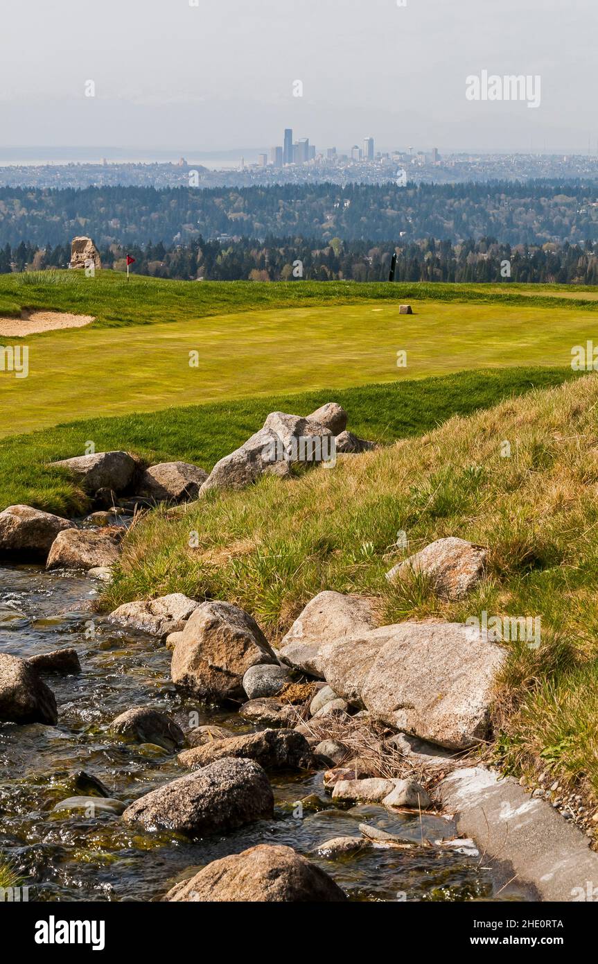 A view of the greens, water hazards (creek), and sand traps at the Golf ...