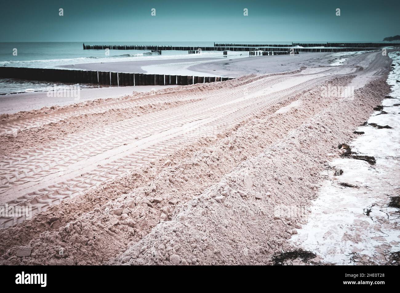 Snow on a beach - winter time Stock Photo - Alamy