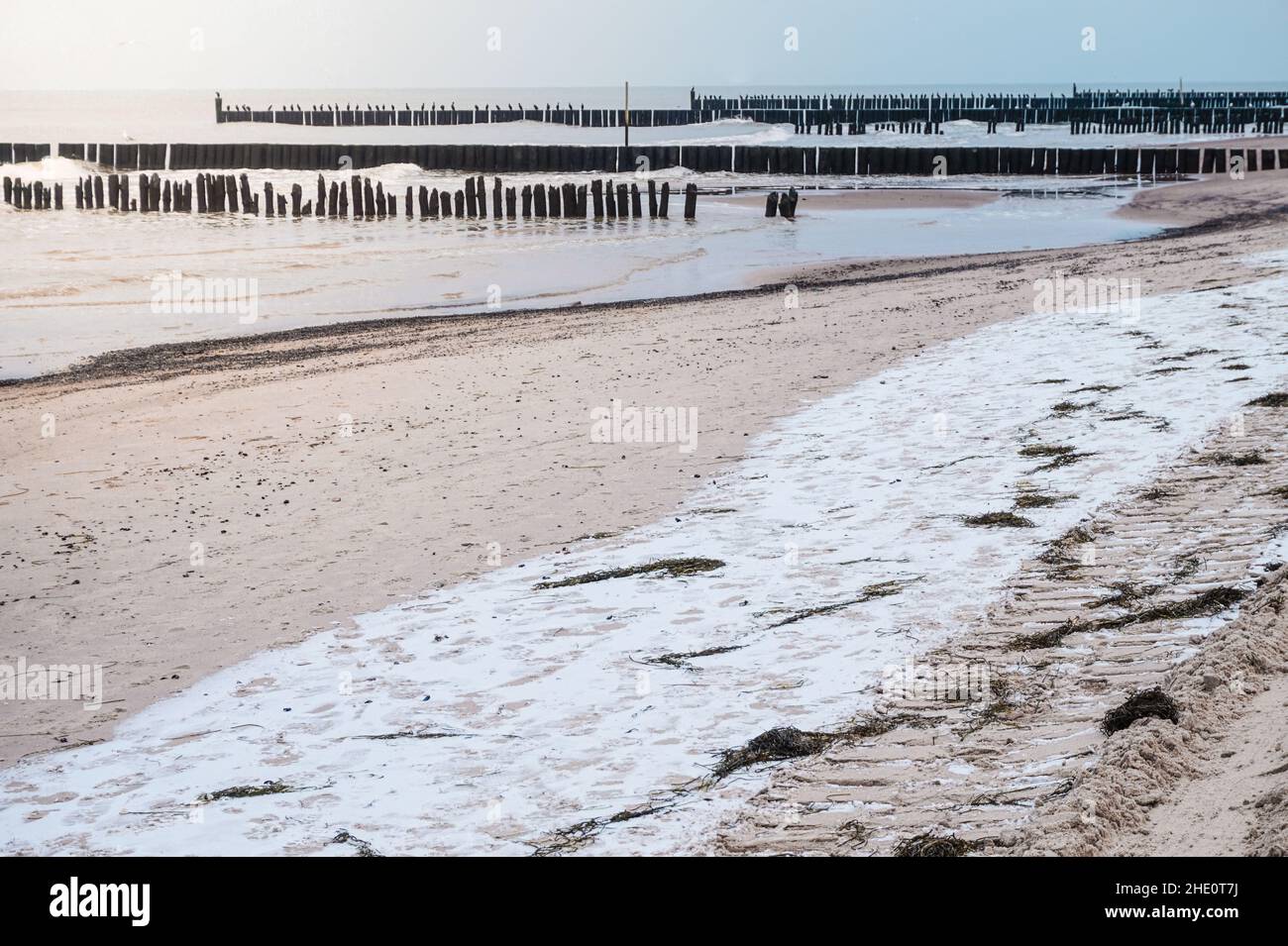 Snow on a beach - winter time Stock Photo - Alamy