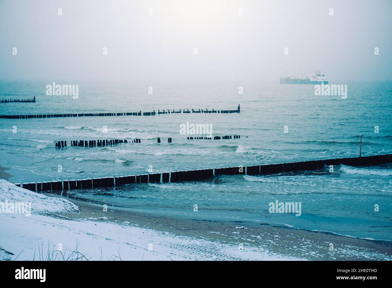 Snow on a beach - winter time Stock Photo - Alamy