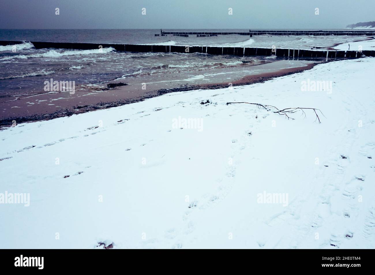 Snow on a beach - winter time Stock Photo - Alamy