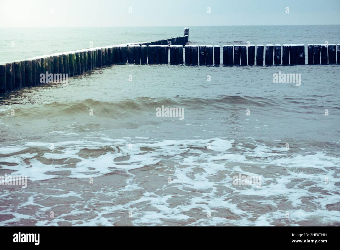 Wooden groyne on a sea Stock Photo - Alamy