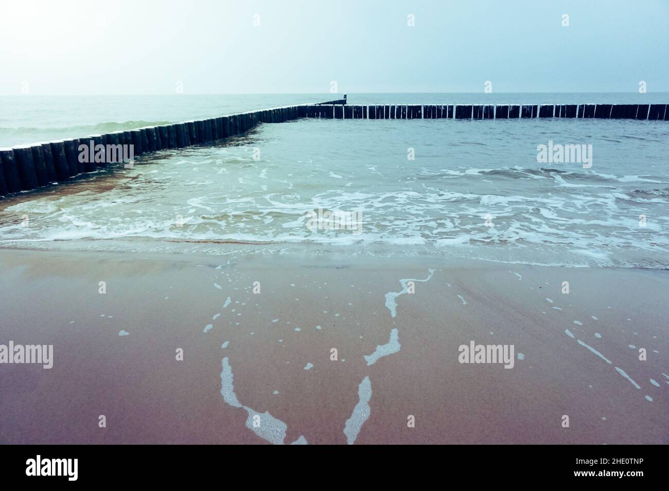 Wooden groyne on a sea Stock Photo - Alamy