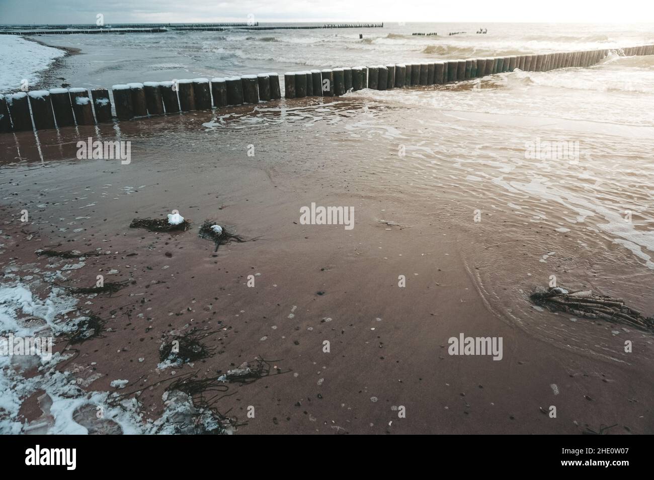 Wooden groyne on a sea Stock Photo - Alamy