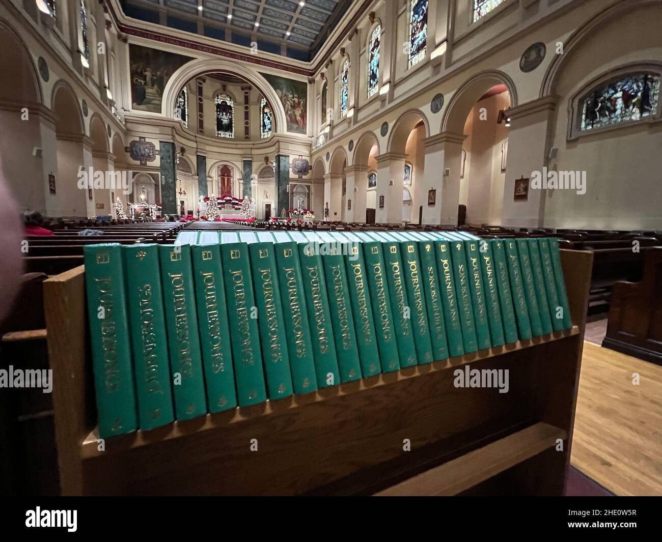 Rack of hymnals for parishoners at Saint Savior's Catholic Church ...
