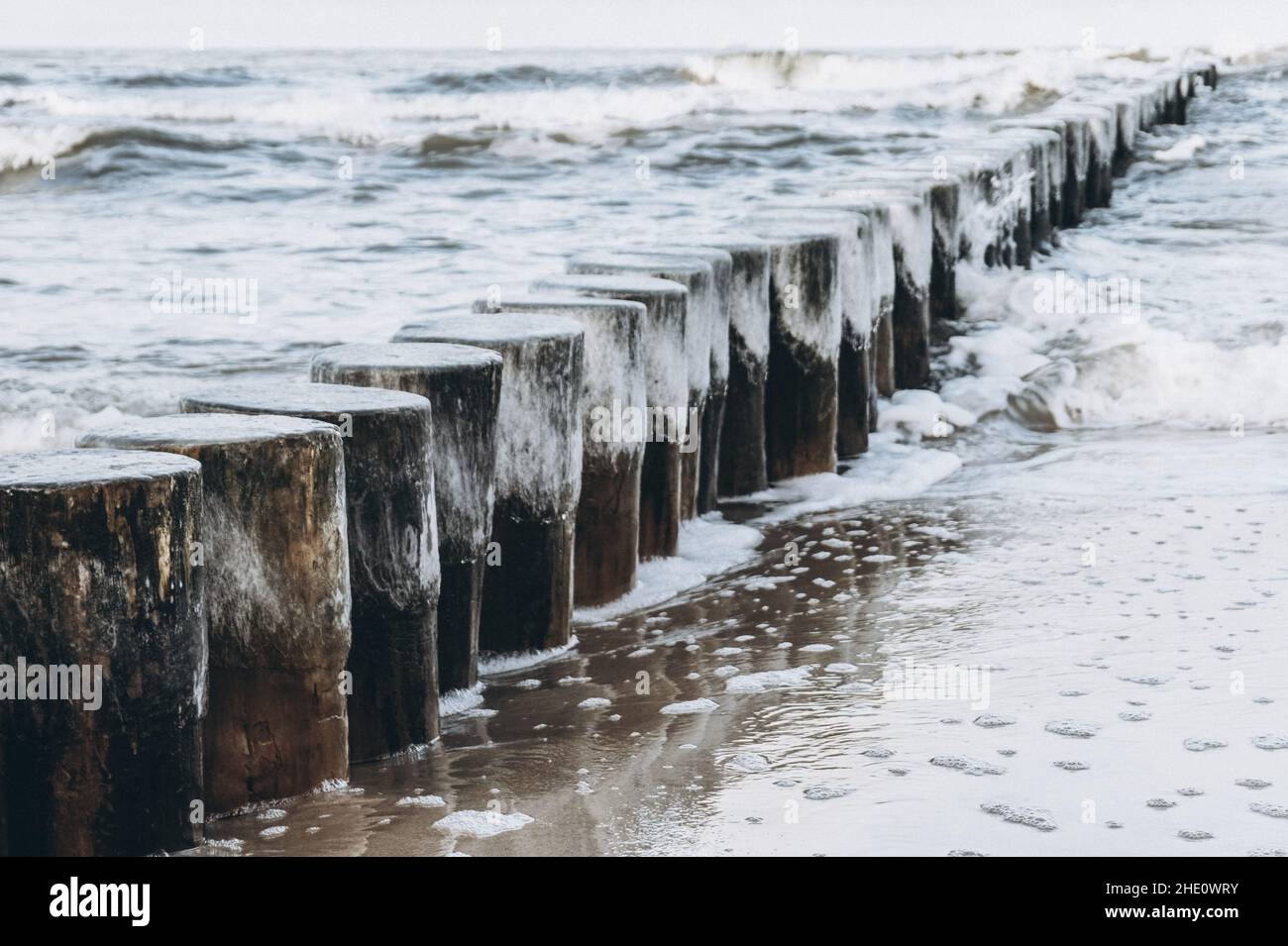 Wooden groyne on a sea Stock Photo - Alamy