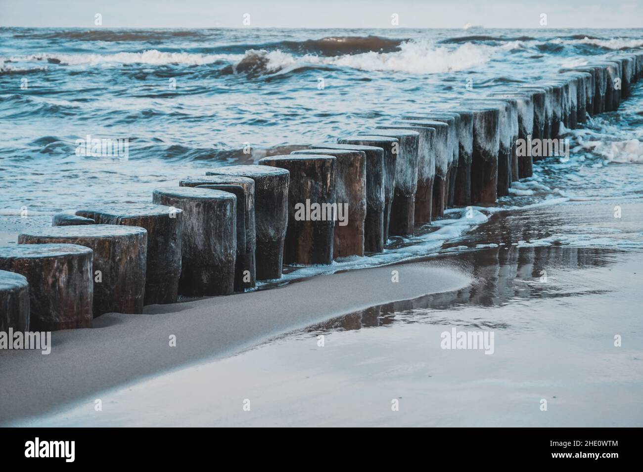 Wooden groyne on a sea Stock Photo - Alamy