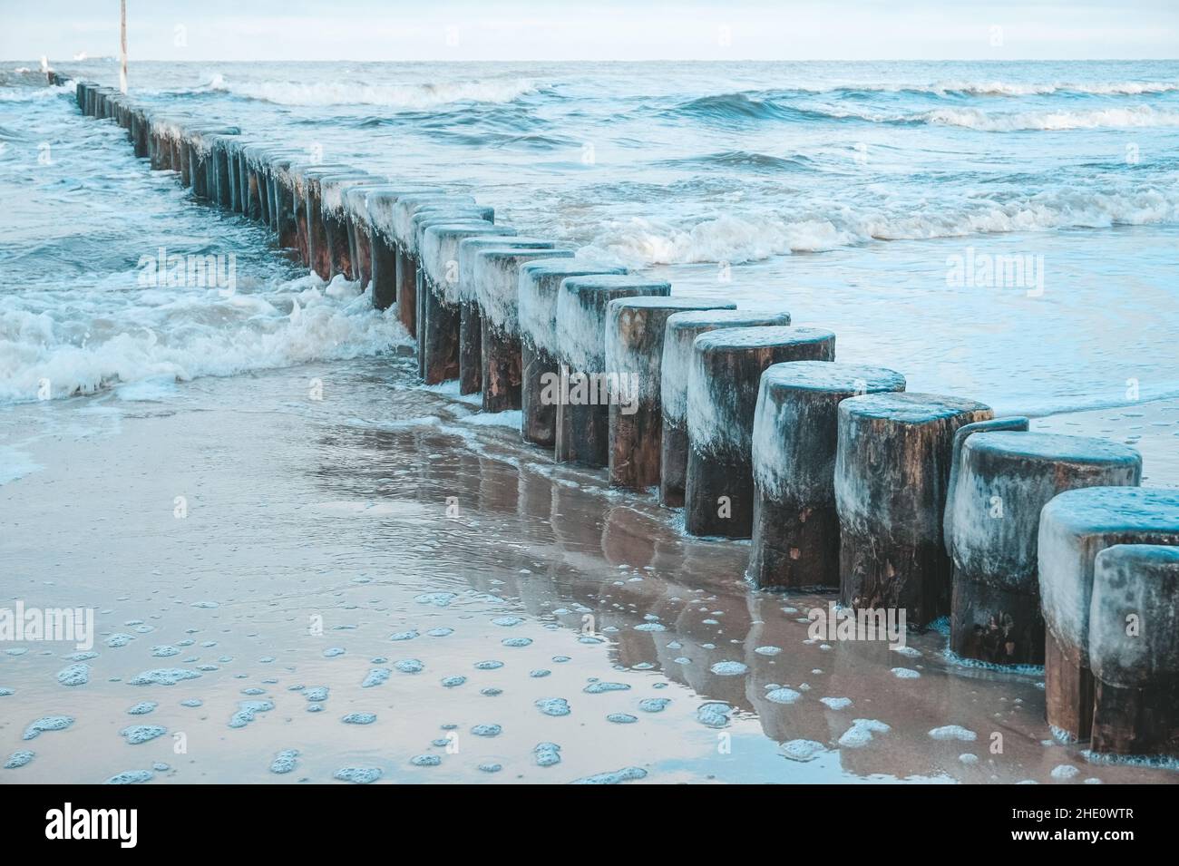 Wooden groyne on a sea Stock Photo - Alamy