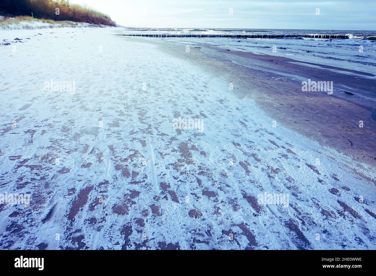 Snow on a beach - winter time Stock Photo - Alamy