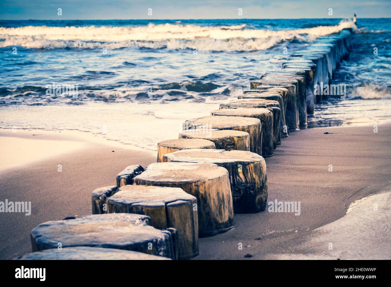 Wooden groyne on a sea Stock Photo - Alamy