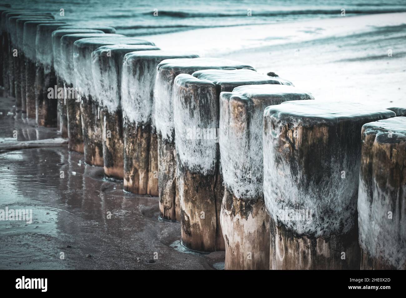 Wooden groyne on a sea Stock Photo - Alamy
