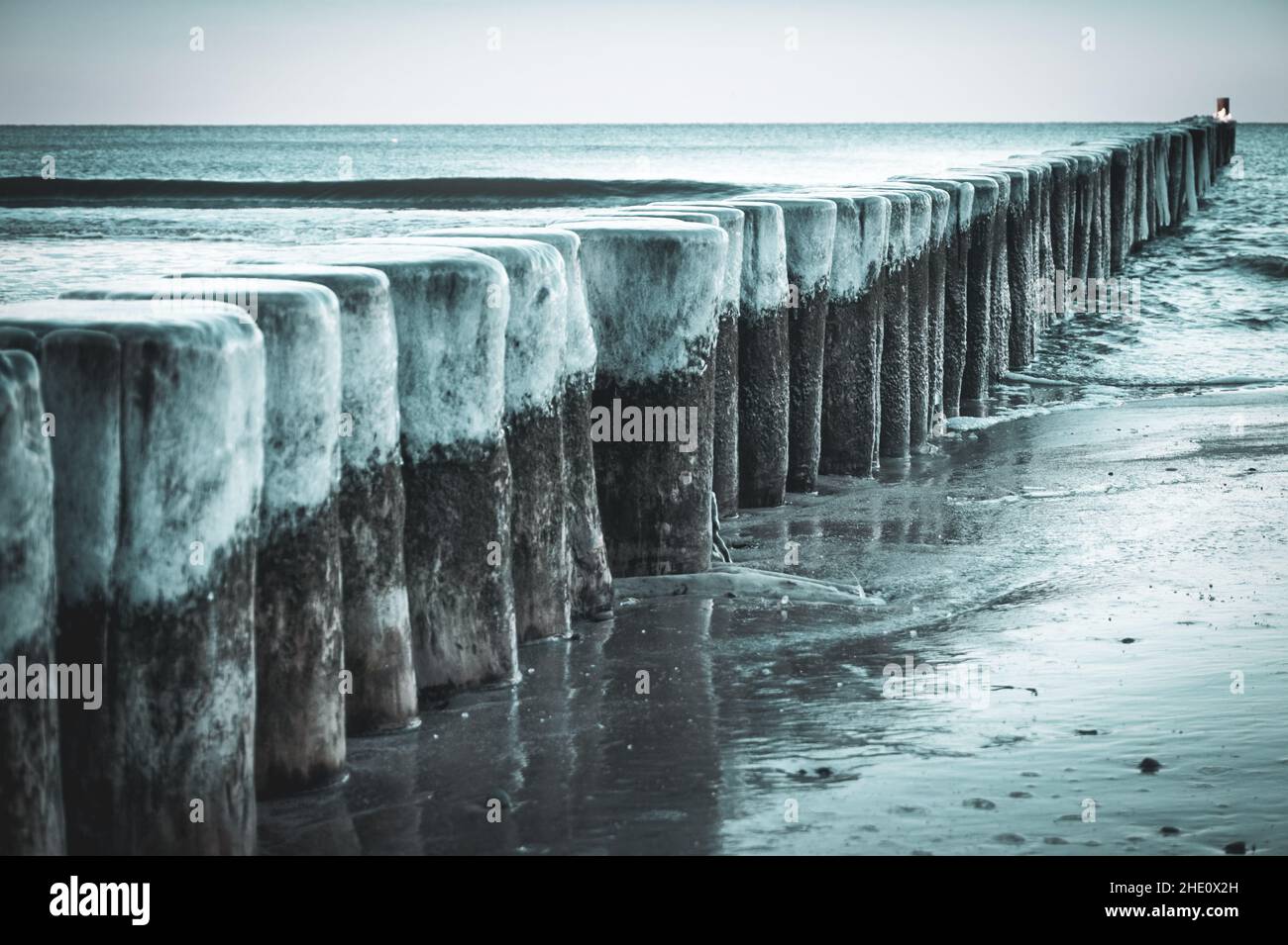 Wooden groyne on a sea Stock Photo - Alamy