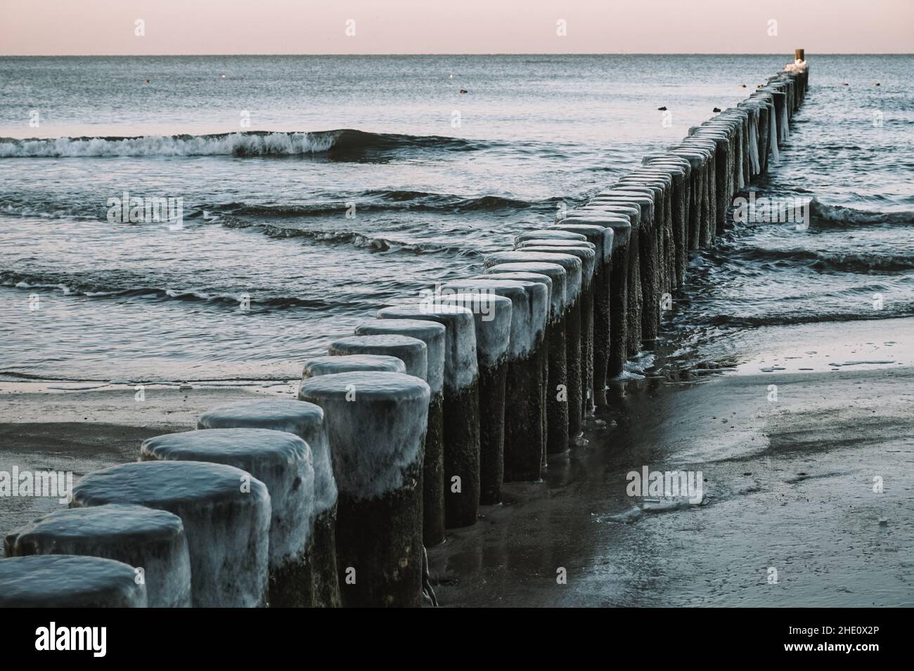 Wooden groyne on a sea Stock Photo - Alamy