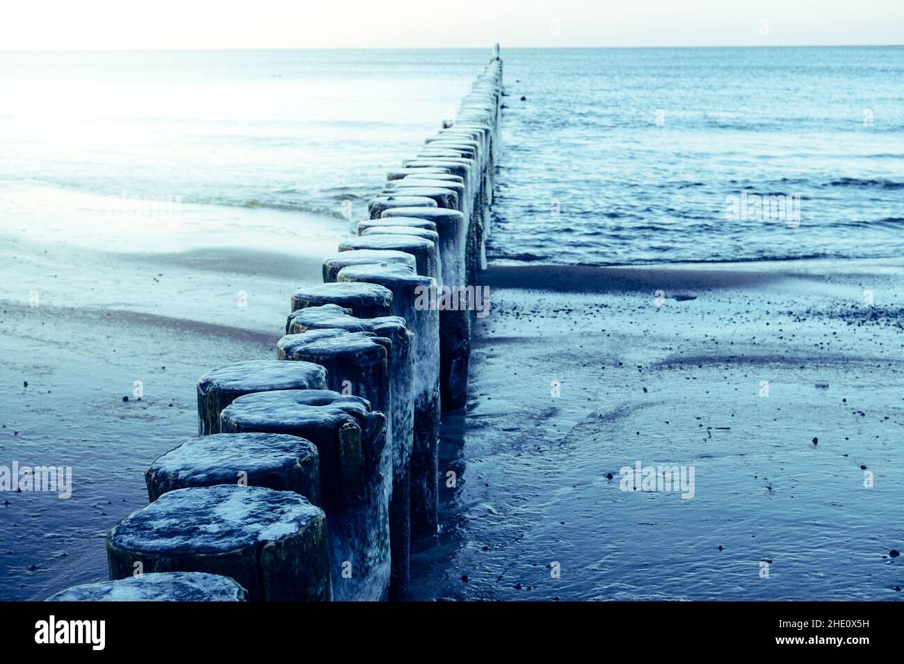 Wooden groyne on a sea Stock Photo - Alamy