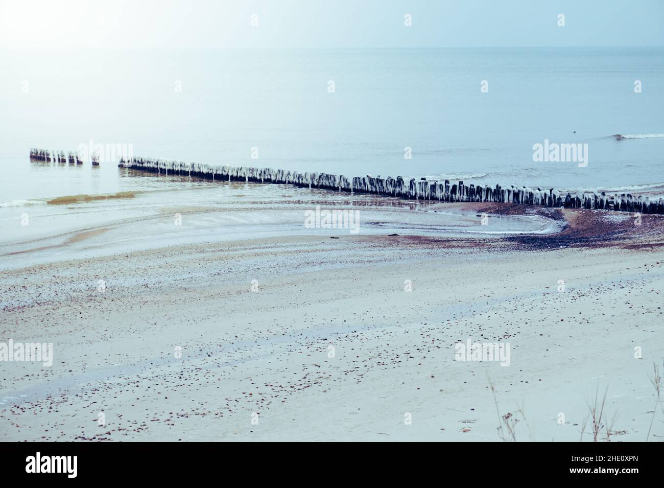 Wooden groyne on a sea Stock Photo - Alamy