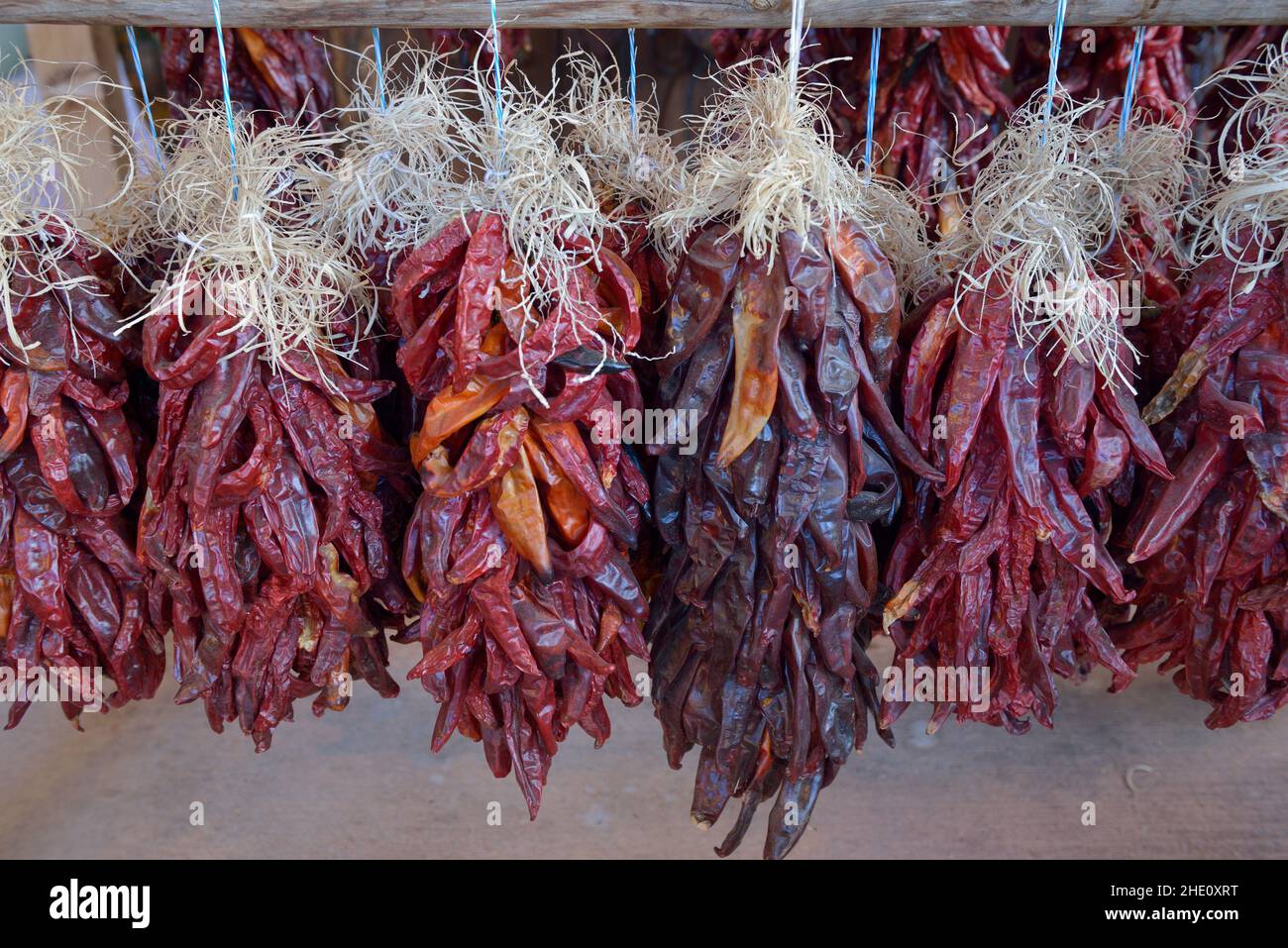 Hanging dried chili peppers hi-res stock photography and images - Alamy