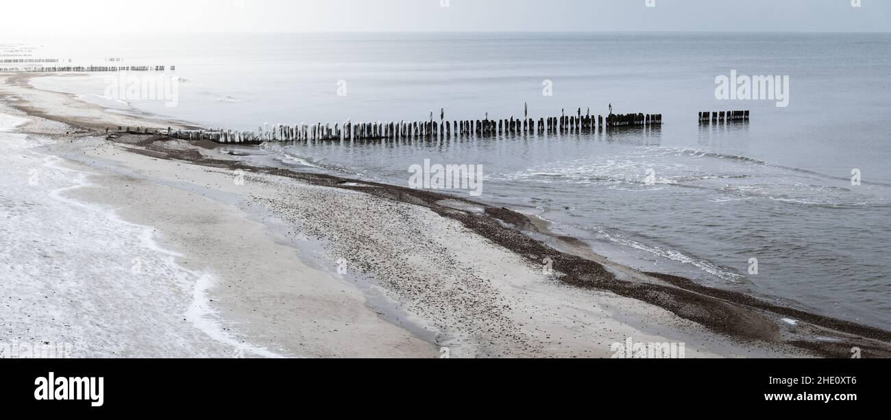 Snow on a beach - winter time Stock Photo - Alamy