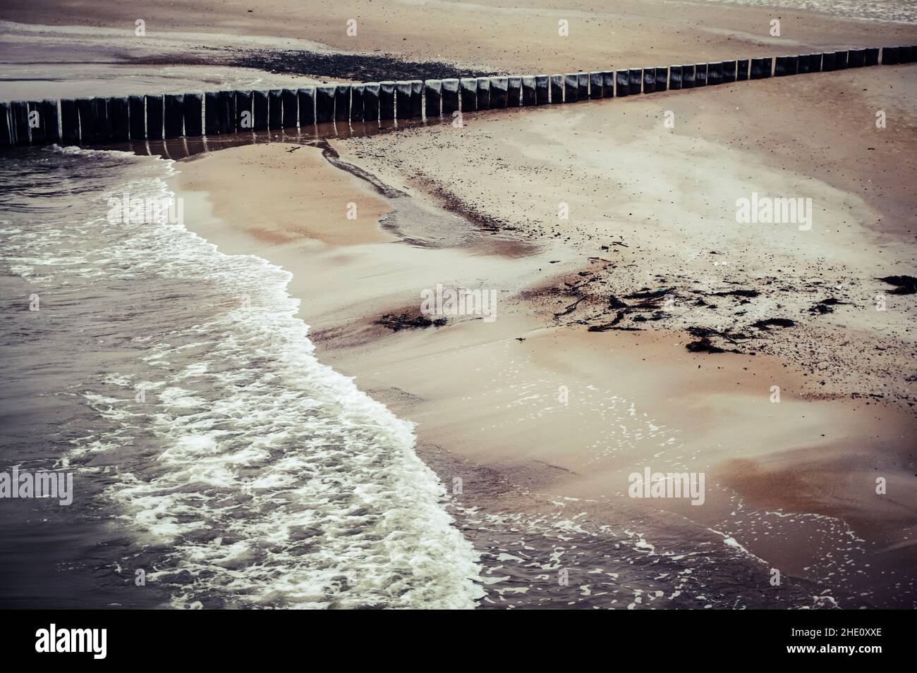 Groyne on a coast Stock Photo - Alamy