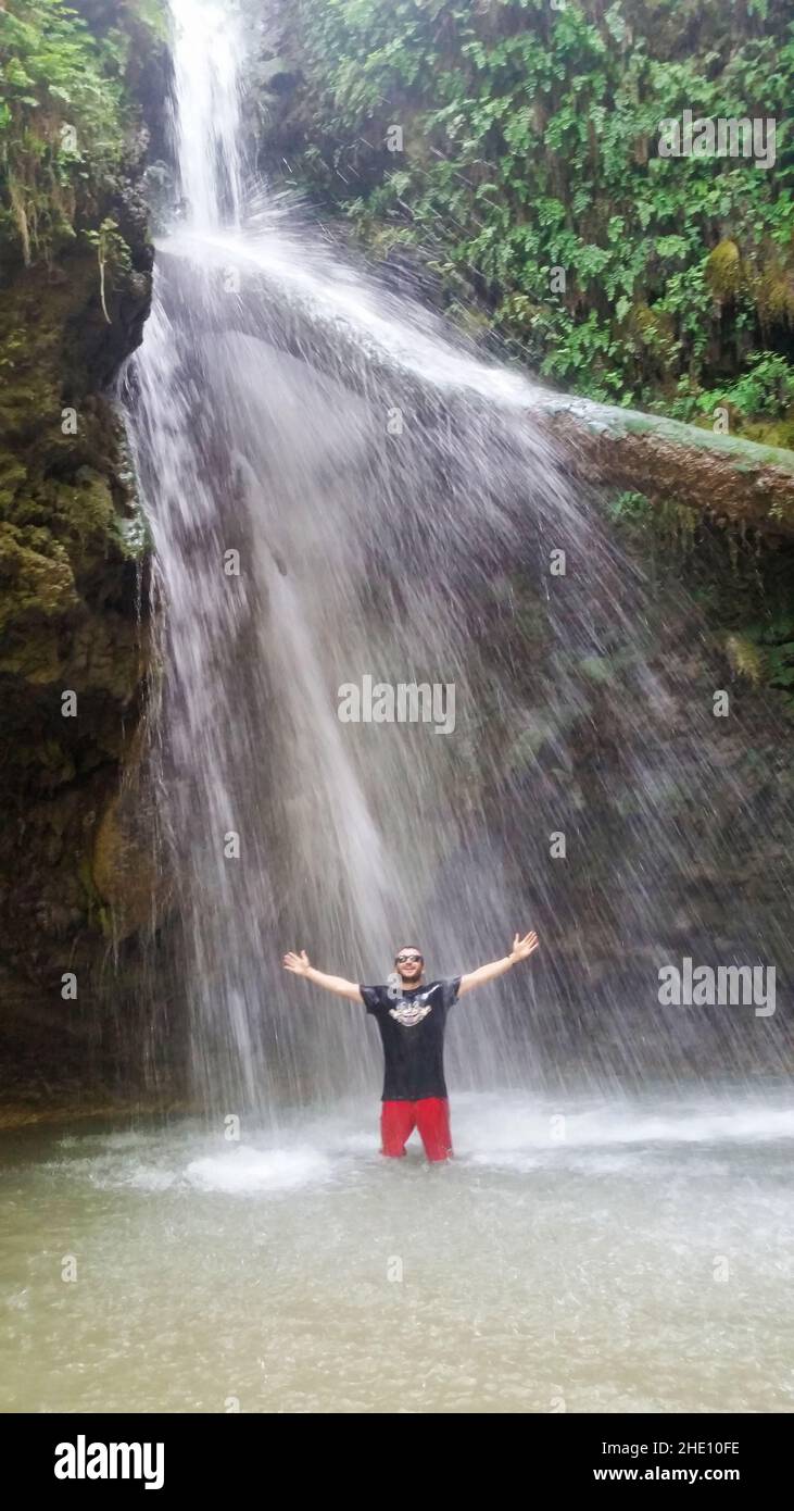 The best shower I have ever had in nature under a waterfall, giving a ...