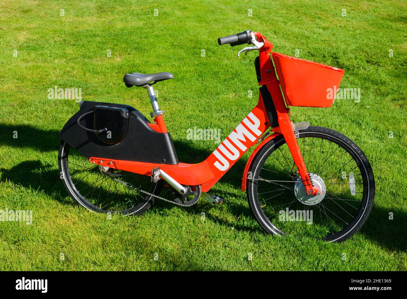 Seattle - July 25, 2021; An orange Jump electric bike parked on an ...