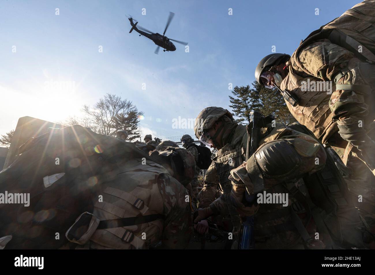 U.S. Army combat medics prepare a simulated casualty for MEDEVAC at the ...