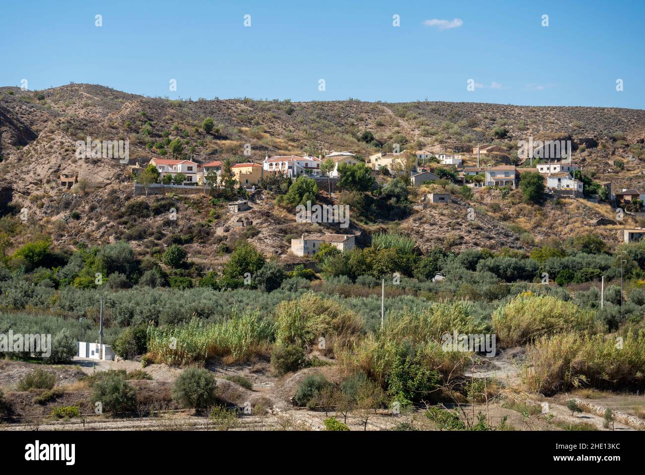 Hillside properties above a rambla outside the town of Oria, a ...