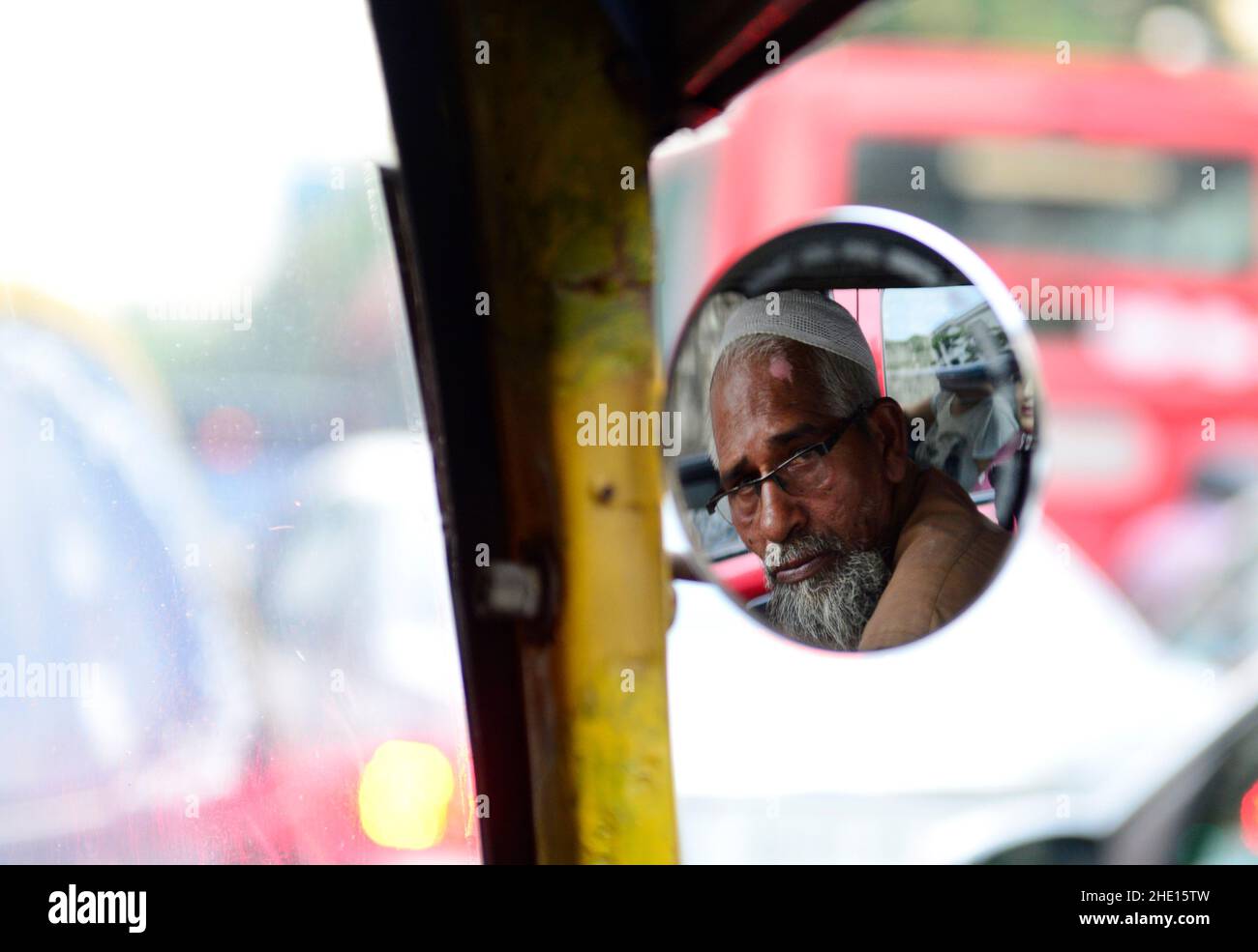 An Indian Muslim auto rickshaw driver in Mumbai, India Stock Photo - Alamy
