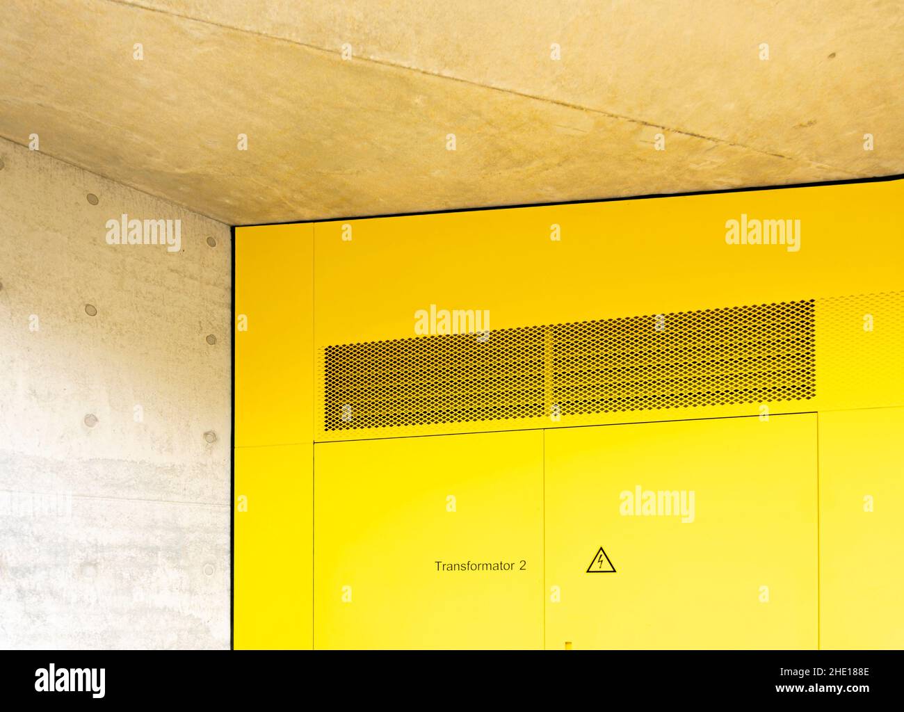 Yellow metal door with transformer 2 sign for security and warning in U ...