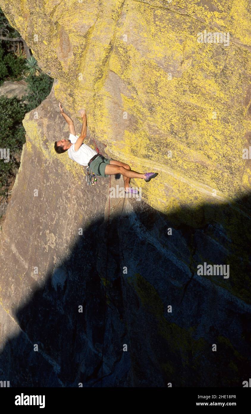 Single male rock climbing in the Santa Catalina Mountains in southern ...