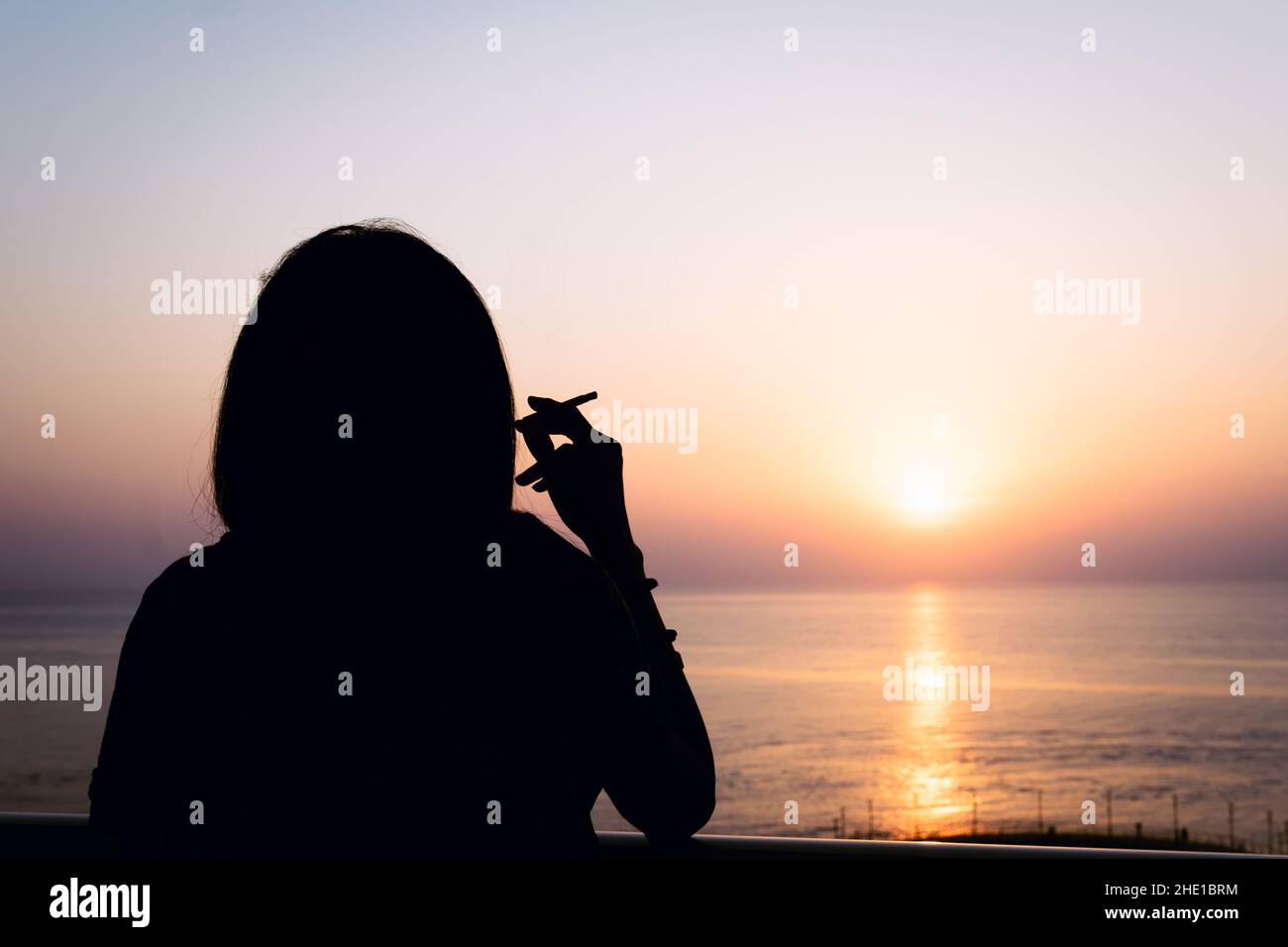 Silhouette of smoking girl hi-res stock photography and images - Alamy