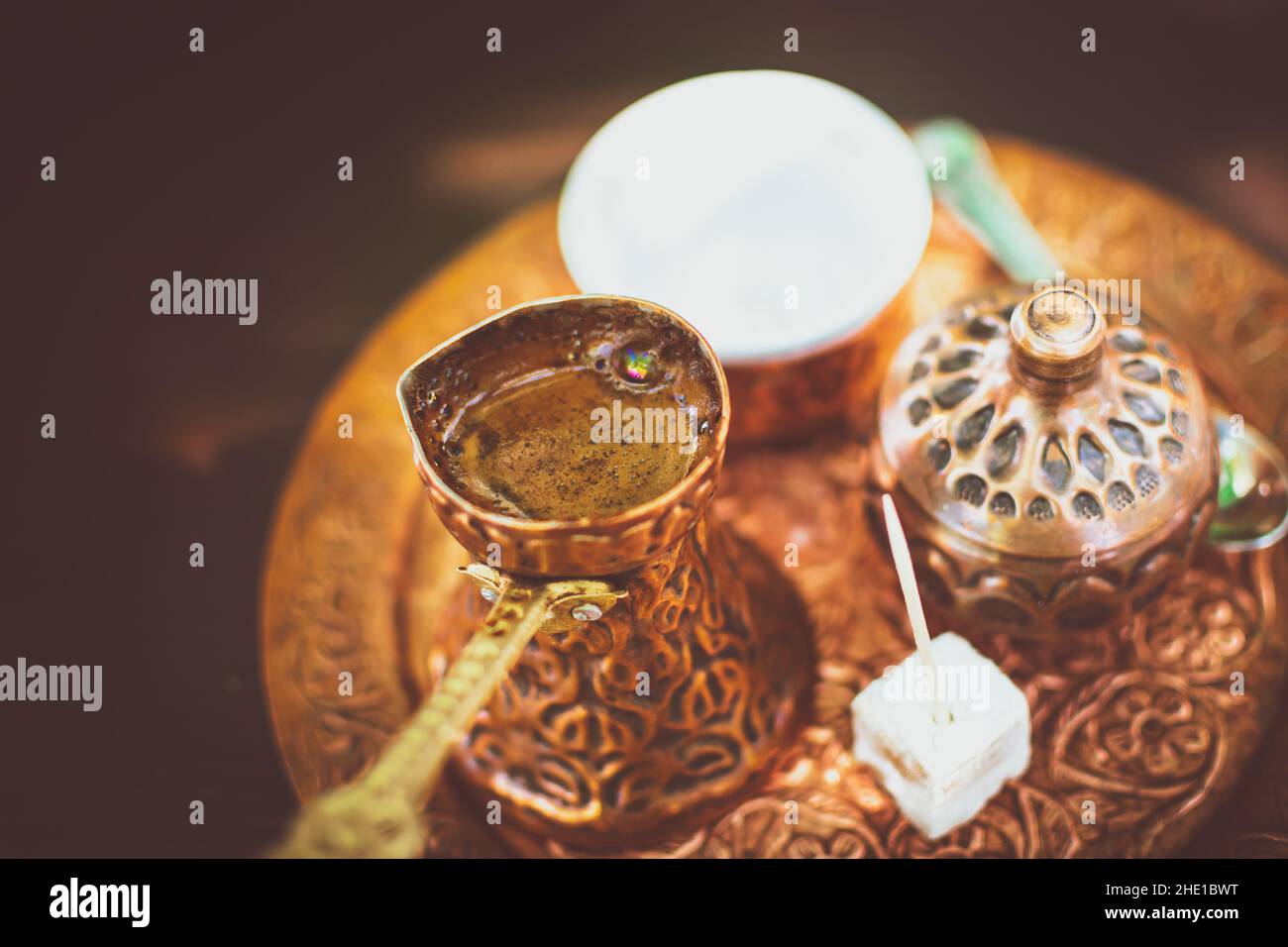 Turkish coffee set up with freshly made coffee and candy with toothpick ...