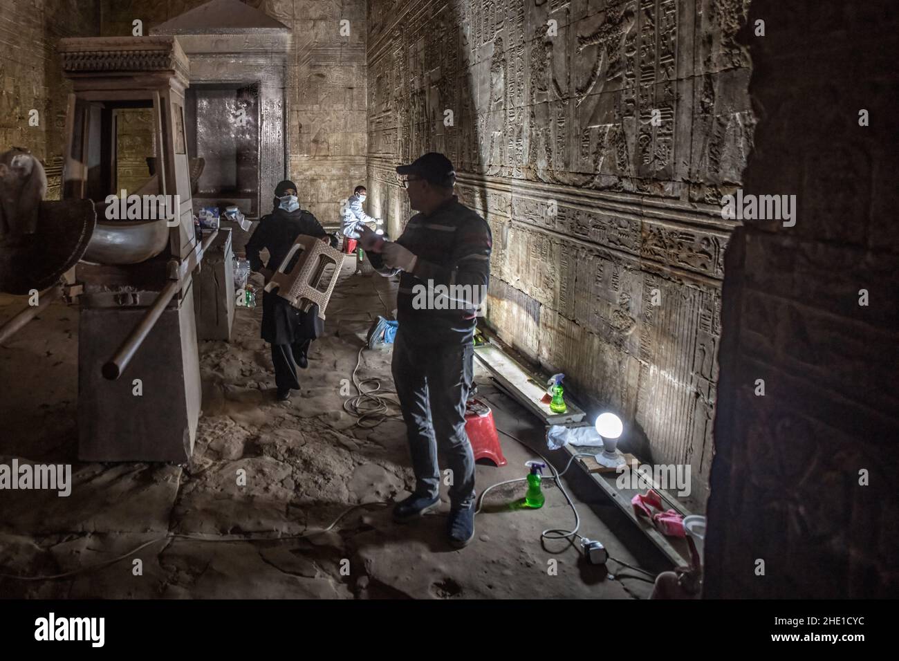 Conservator restorers working to repair and restore ancient egyptian ...