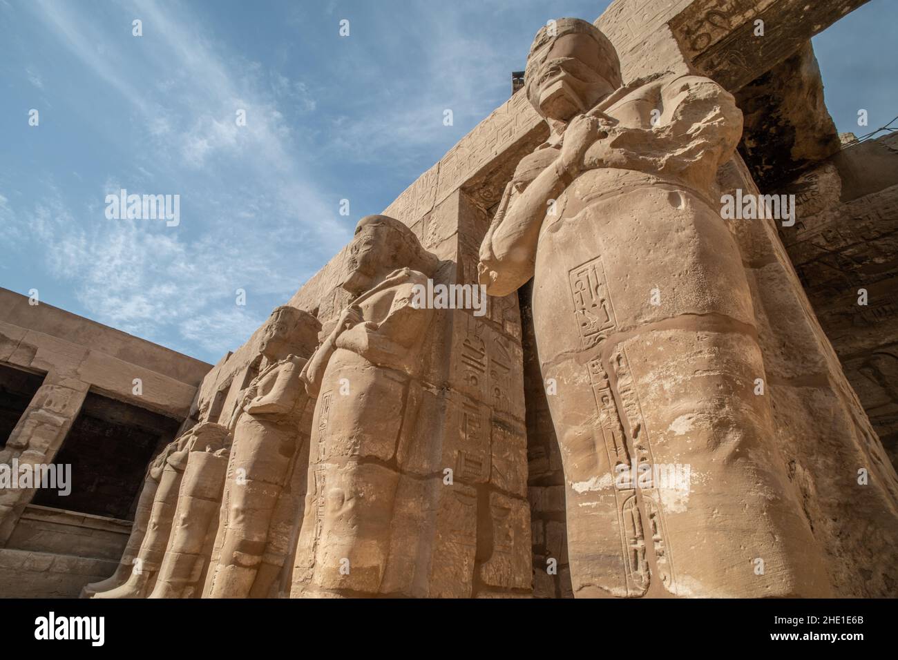 Stone figures depicting Ramses II as Osiris in the Karnak temple ...