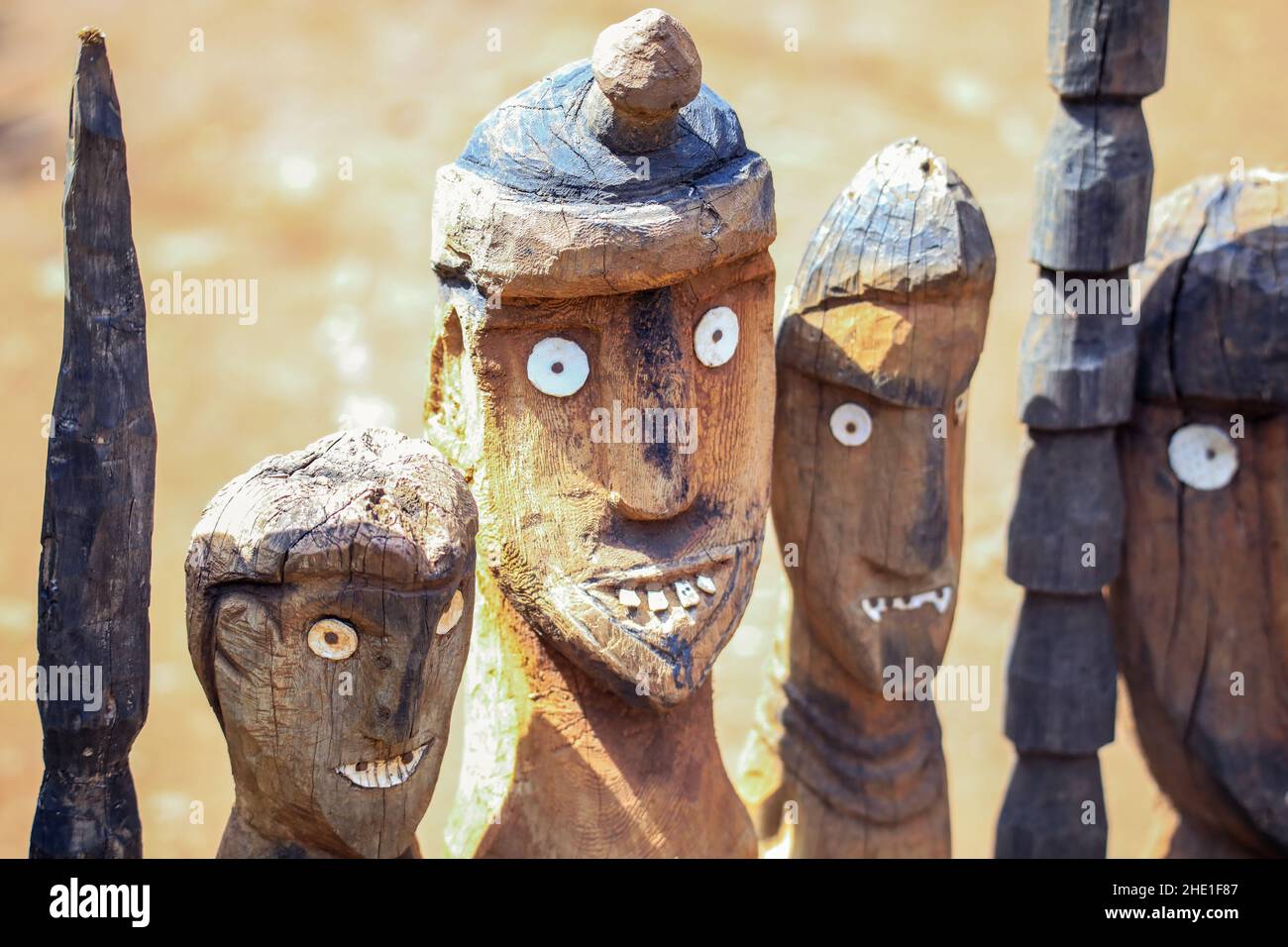 Wooden memorial Totems (statues) with Eyes and Sticks in Traditional ...