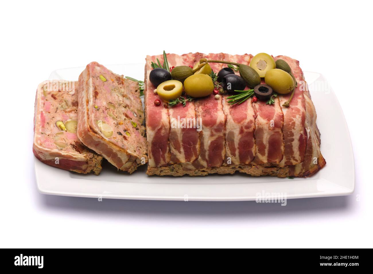 Traditional French terrine covered with bacon isolated on white ...