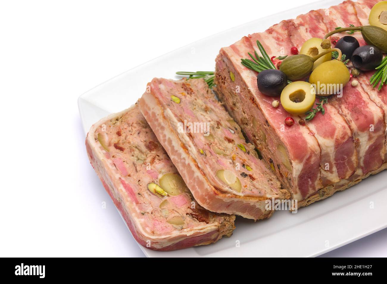 Traditional French terrine covered with bacon isolated on white ...