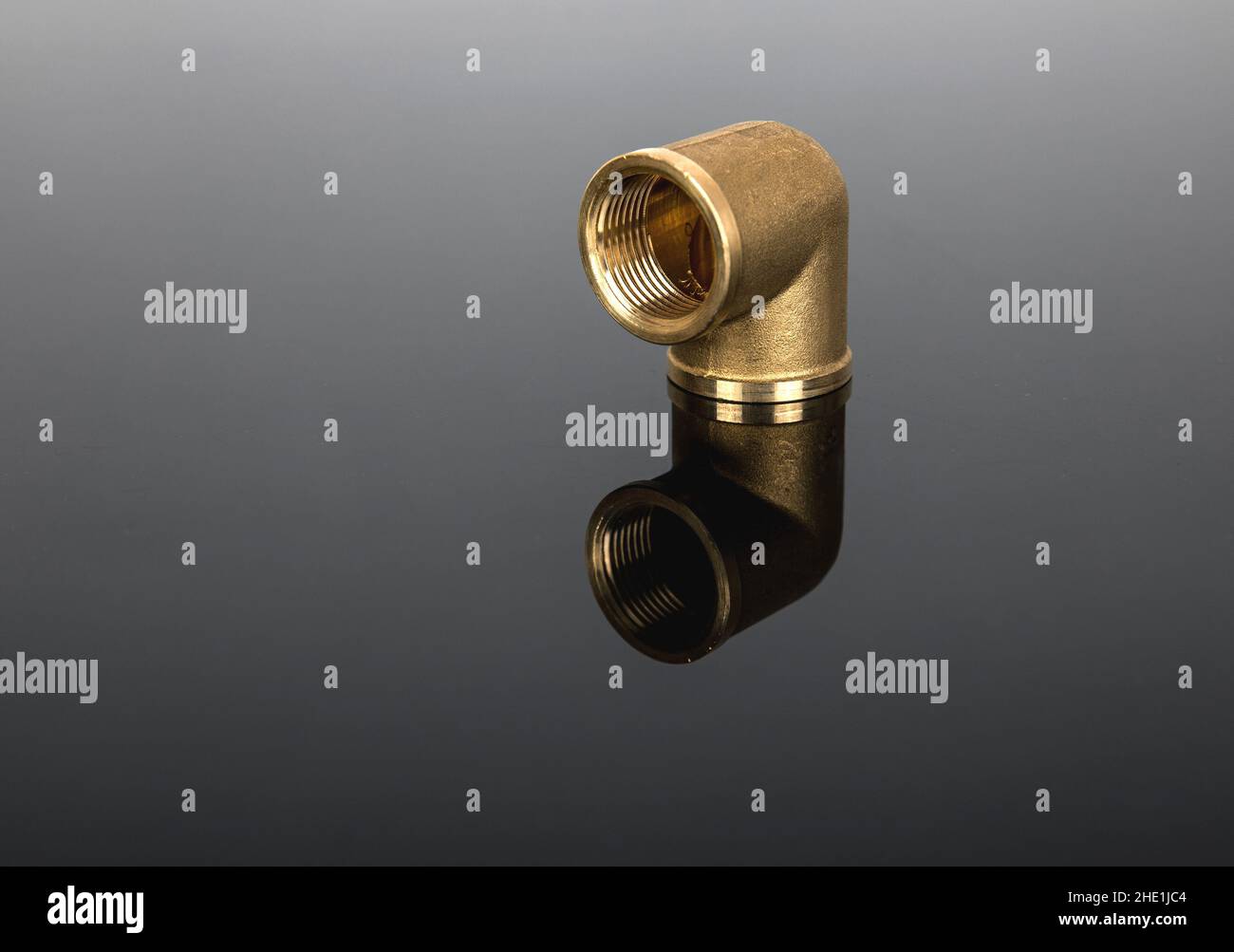 Plumbing valves, ball valves, fasteners and fittings on the black ...