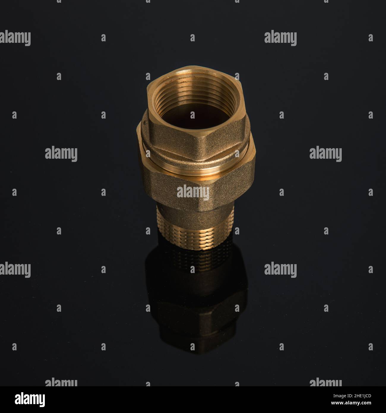 Plumbing valves, ball valves, fasteners and fittings on the black ...