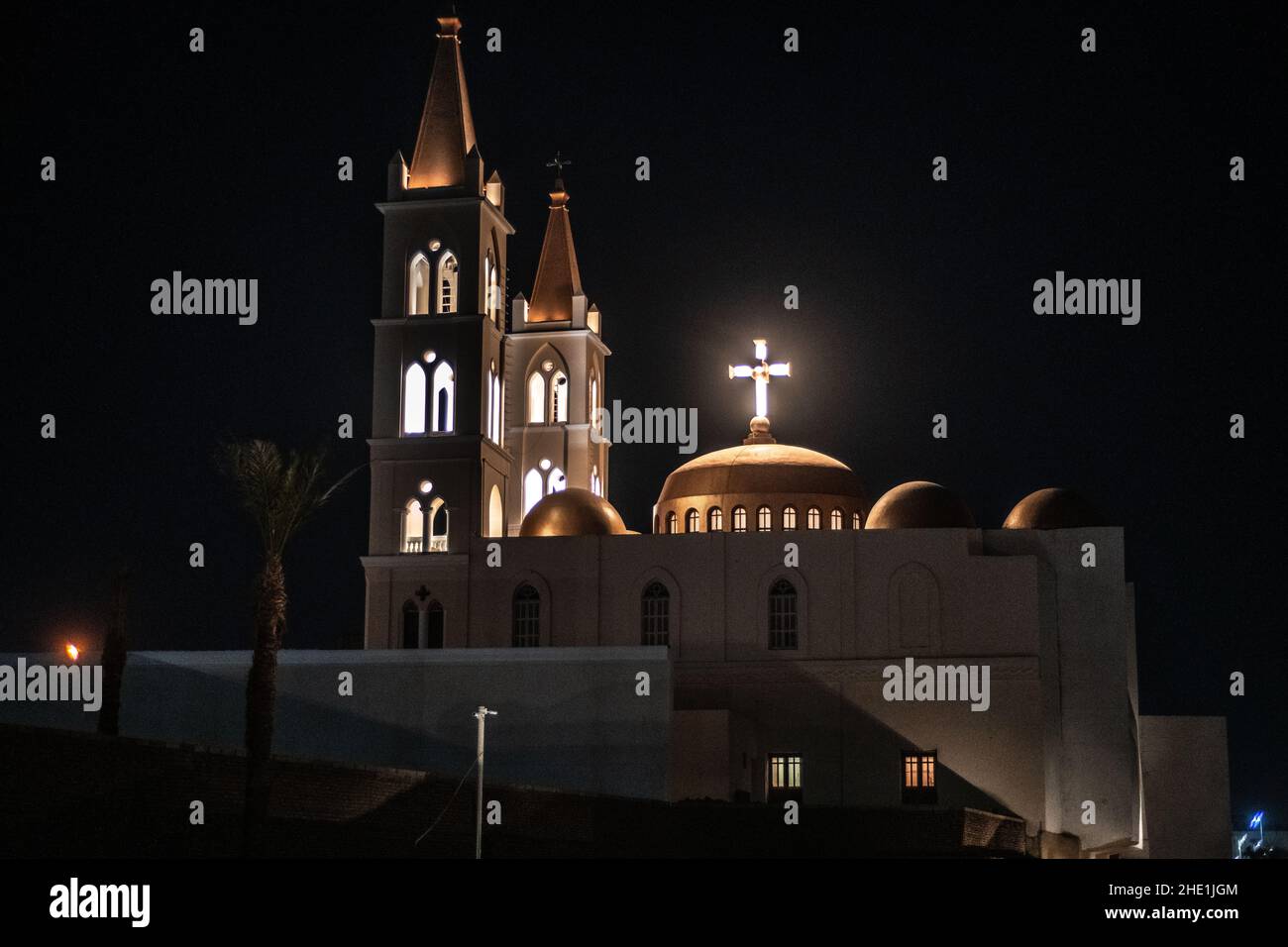 The St. Mary coptic orthodox church in Luxor, Egypt lit up at night ...