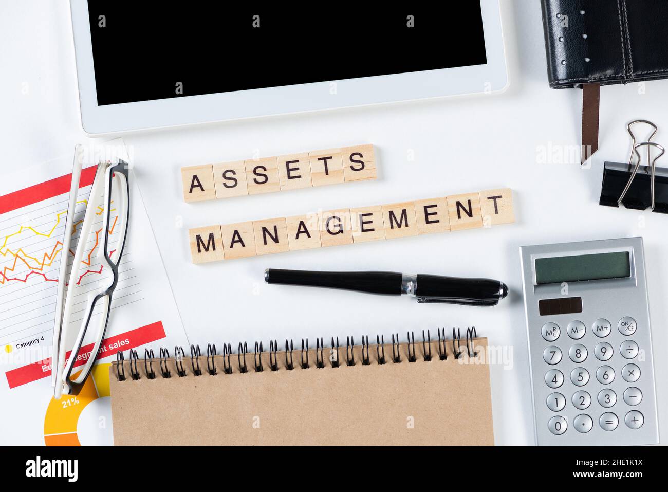 Asset management concept with letters on cubes Stock Photo - Alamy