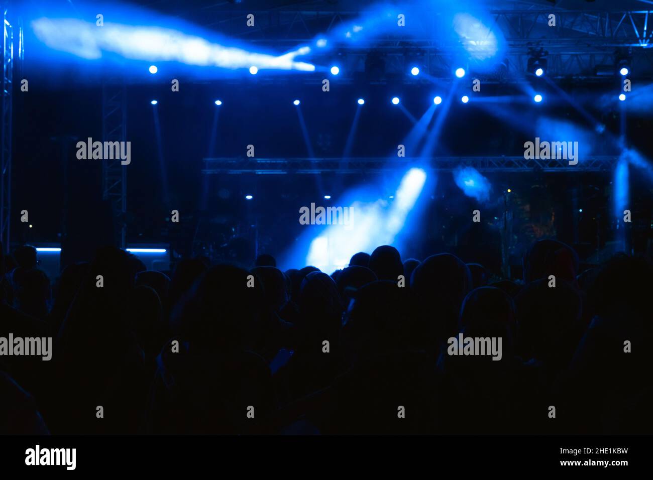 Concert background. Blue and foggy spotlights on the stage. concert or ...