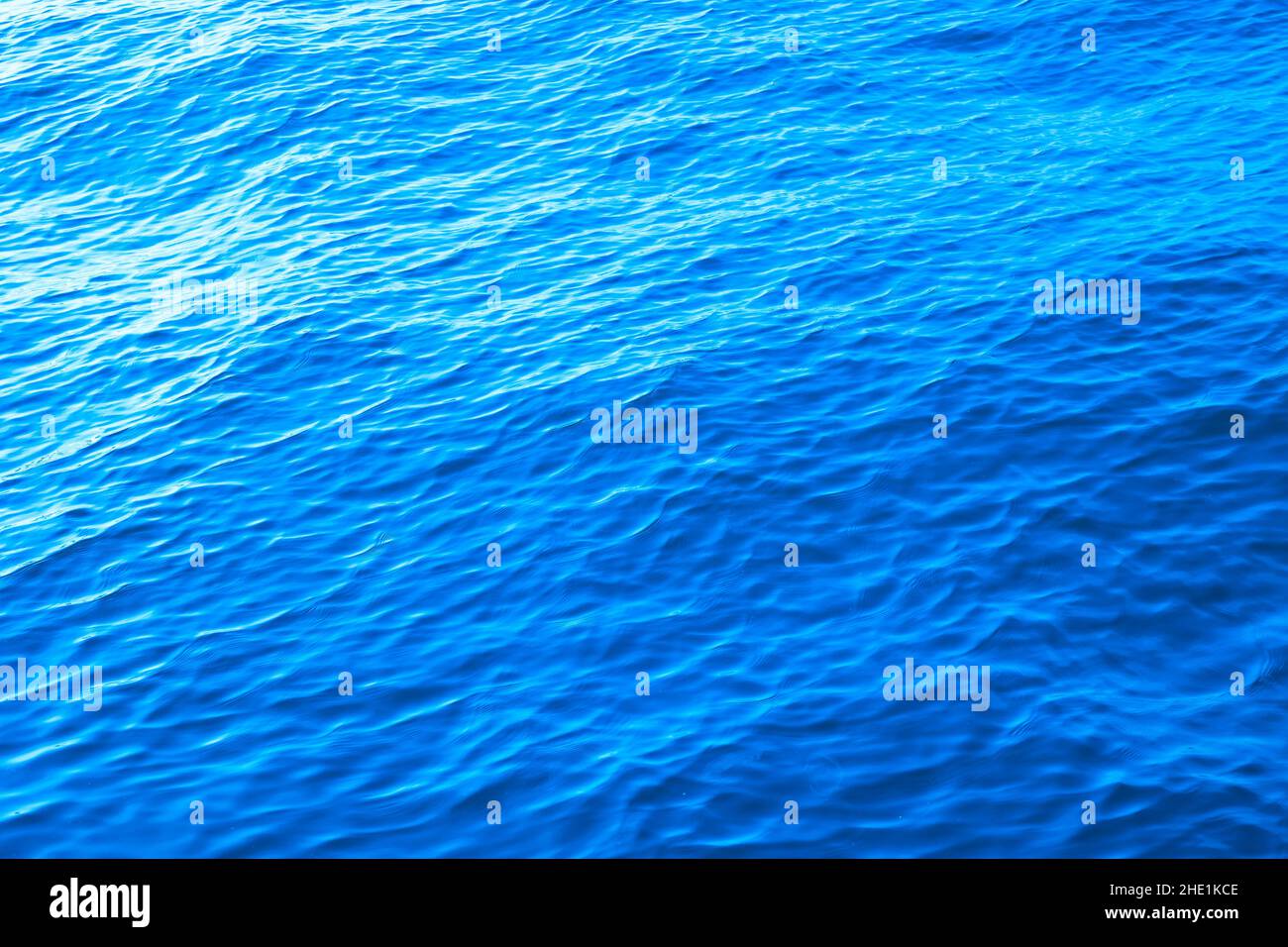 Blue calm sea. Calm sea background photo with little waves. Abstract ...