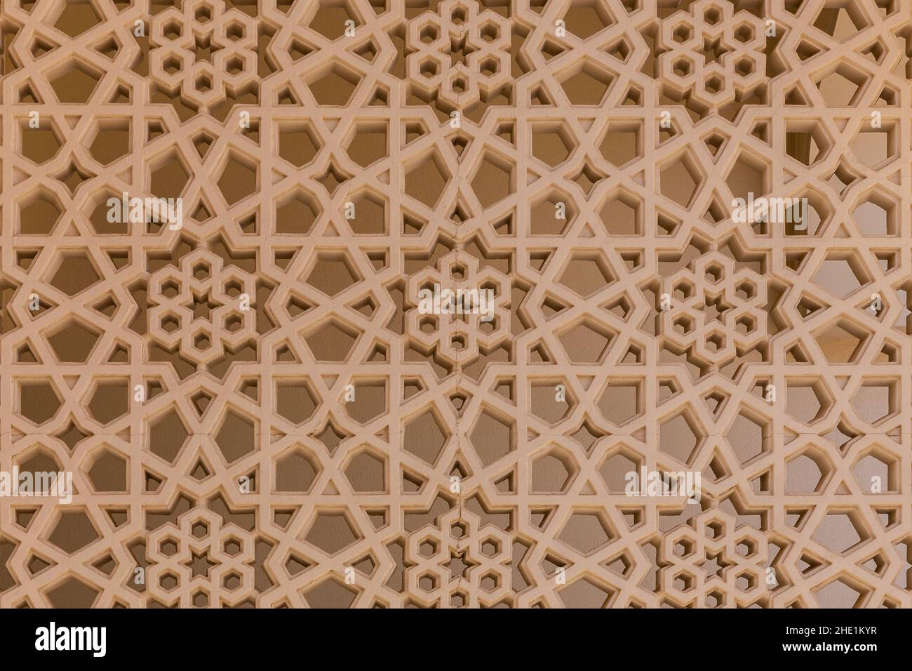 Arabic style carved stone openwork on a building facade in Old Dubai ...