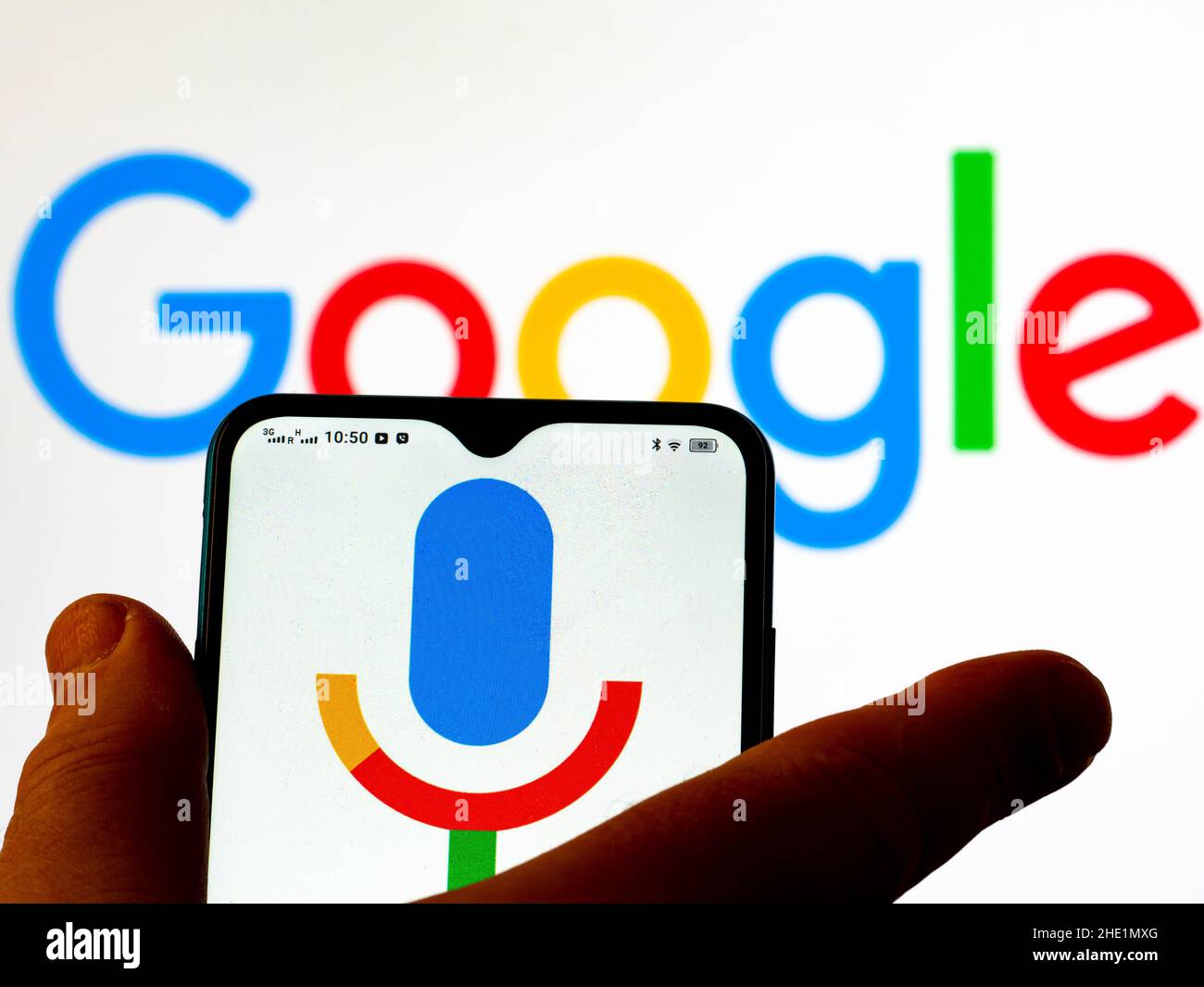 In this photo illustration Google Voice Search logo seen displayed on a ...