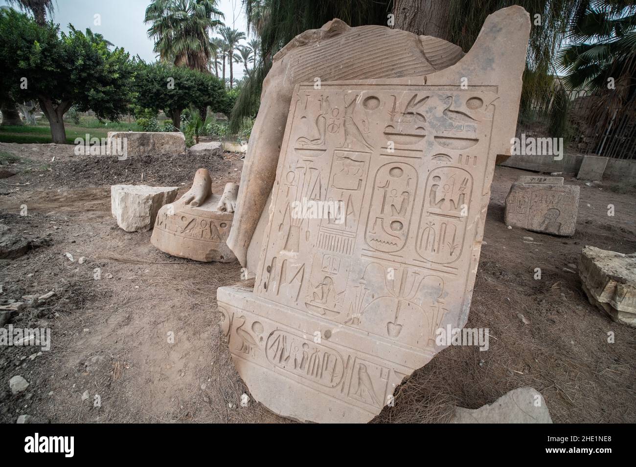 An ancient stone slab with egyptian hieroglyphs carved on it sits ...