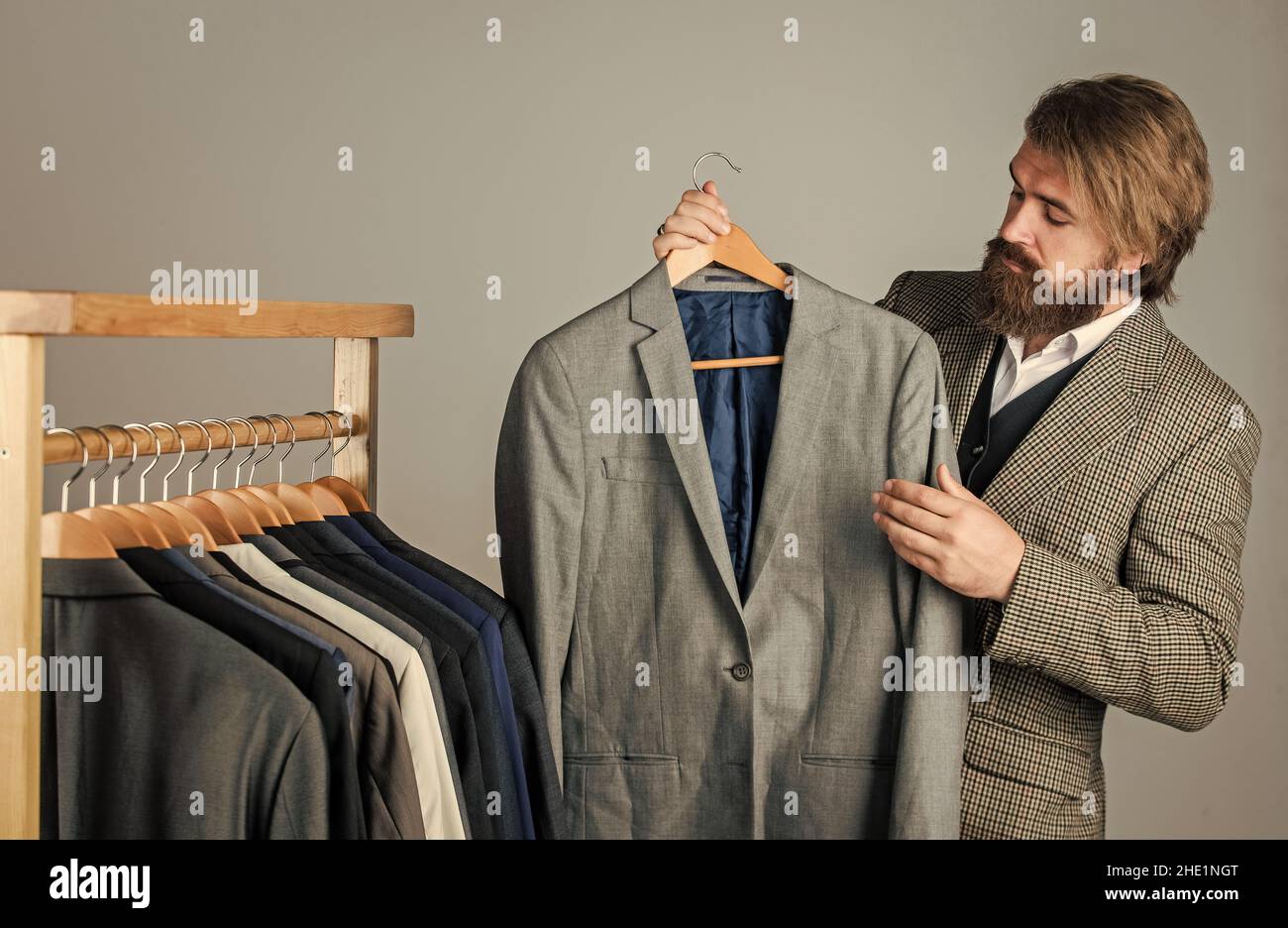 Fashioner man designing formal clothes premium quality, vintage piece ...