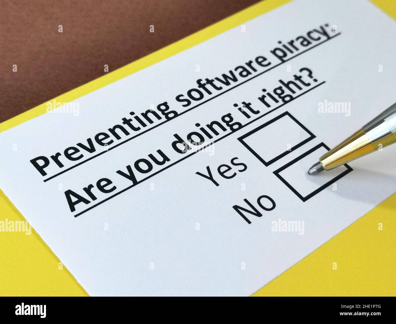 One person is answering question about software piracy Stock Photo - Alamy