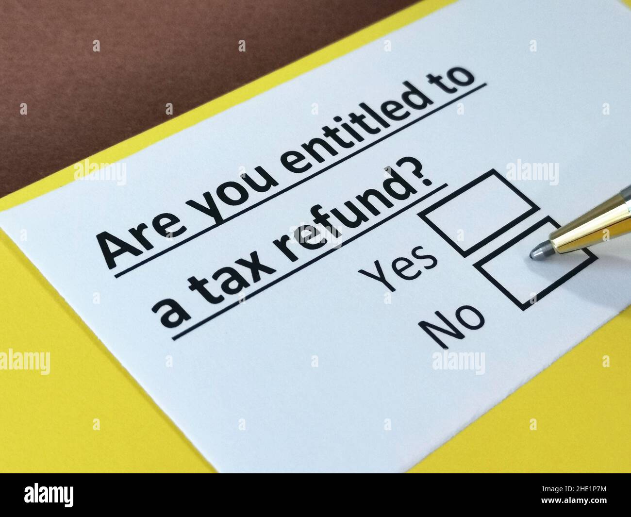 One person is answering question about tax refund Stock Photo - Alamy
